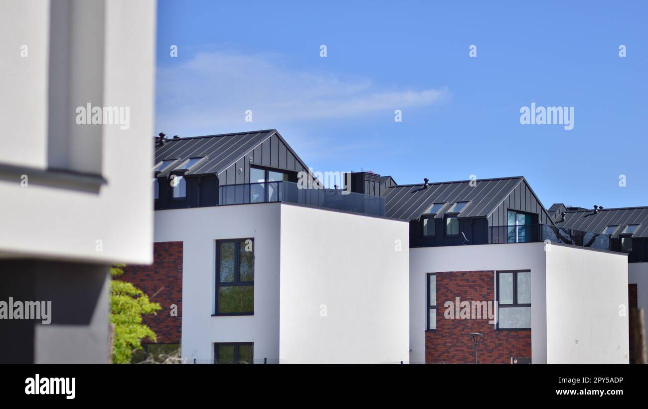 Terraced family homes in newly developed housing estate. The real ...