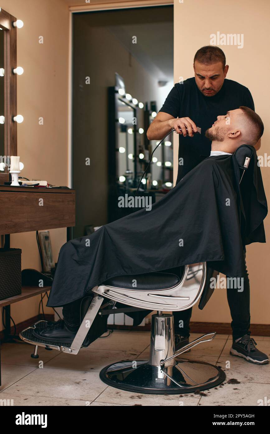 Bearded man barber razor portrait hi-res stock photography and images ...