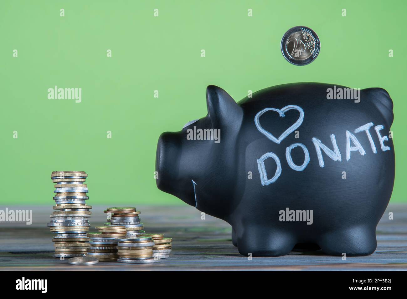 Donate here sign hi-res stock photography and images - Alamy