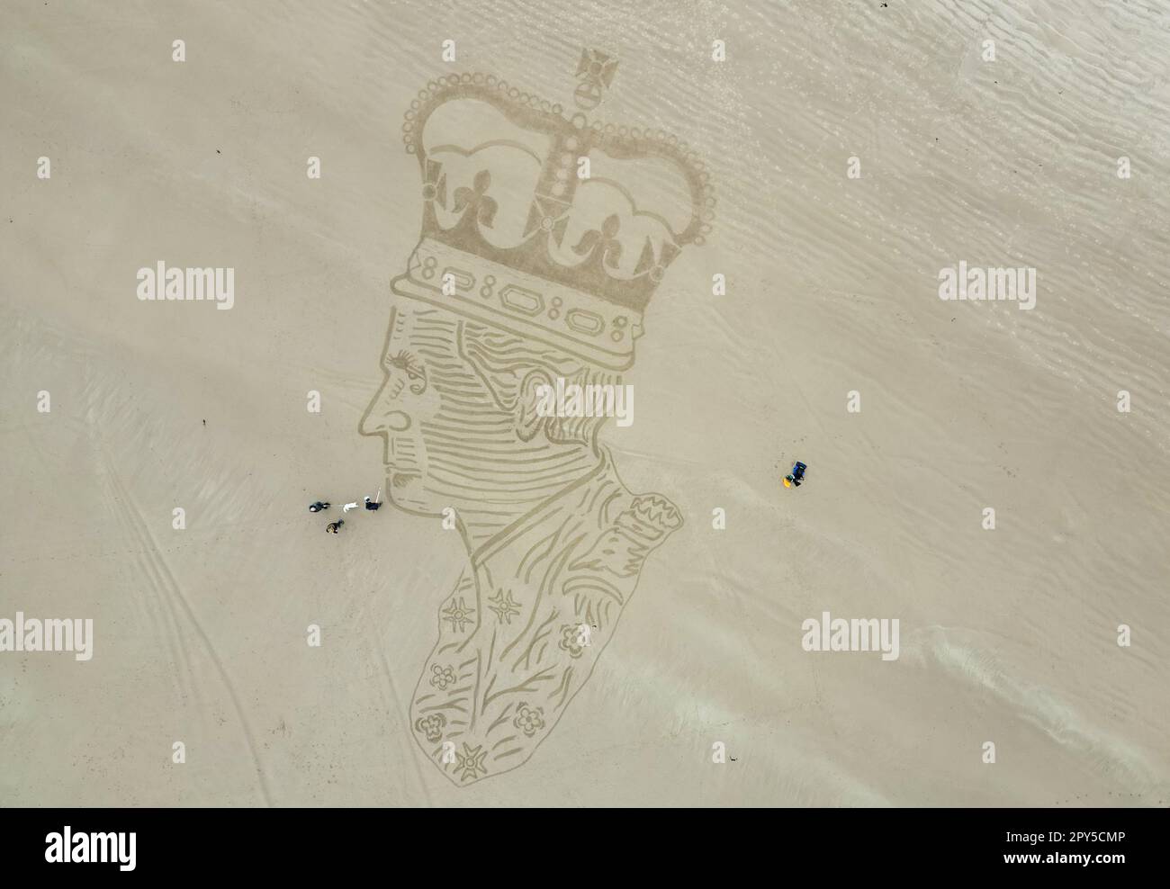 Sand artist Claire Eason from soul to sand puts the finishing touches ...