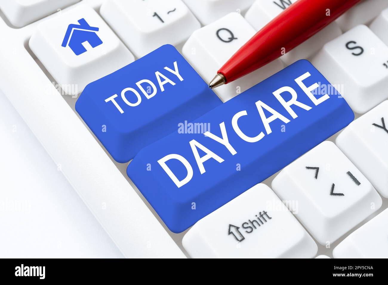 Hand writing sign Daycare. Word for offering care to preschool children ...