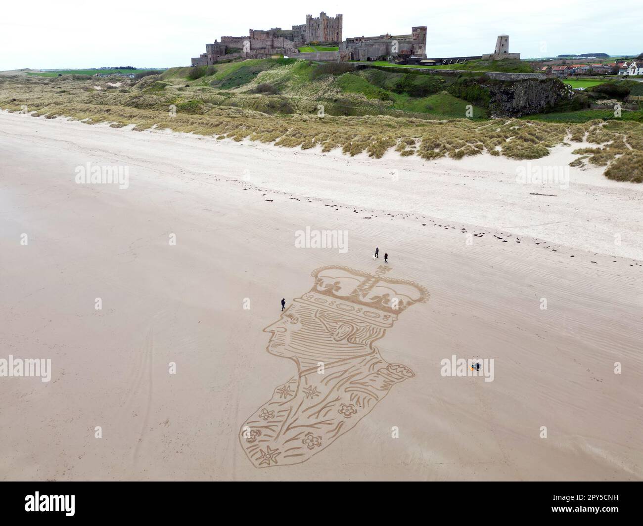 Sand artist Claire Eason from soul to sand puts the finishing touches ...