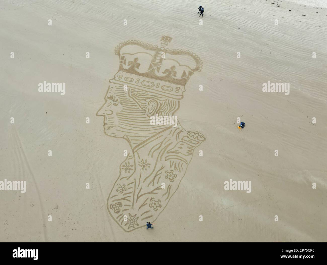 Sand artist Claire Eason from soul to sand puts the finishing touches ...