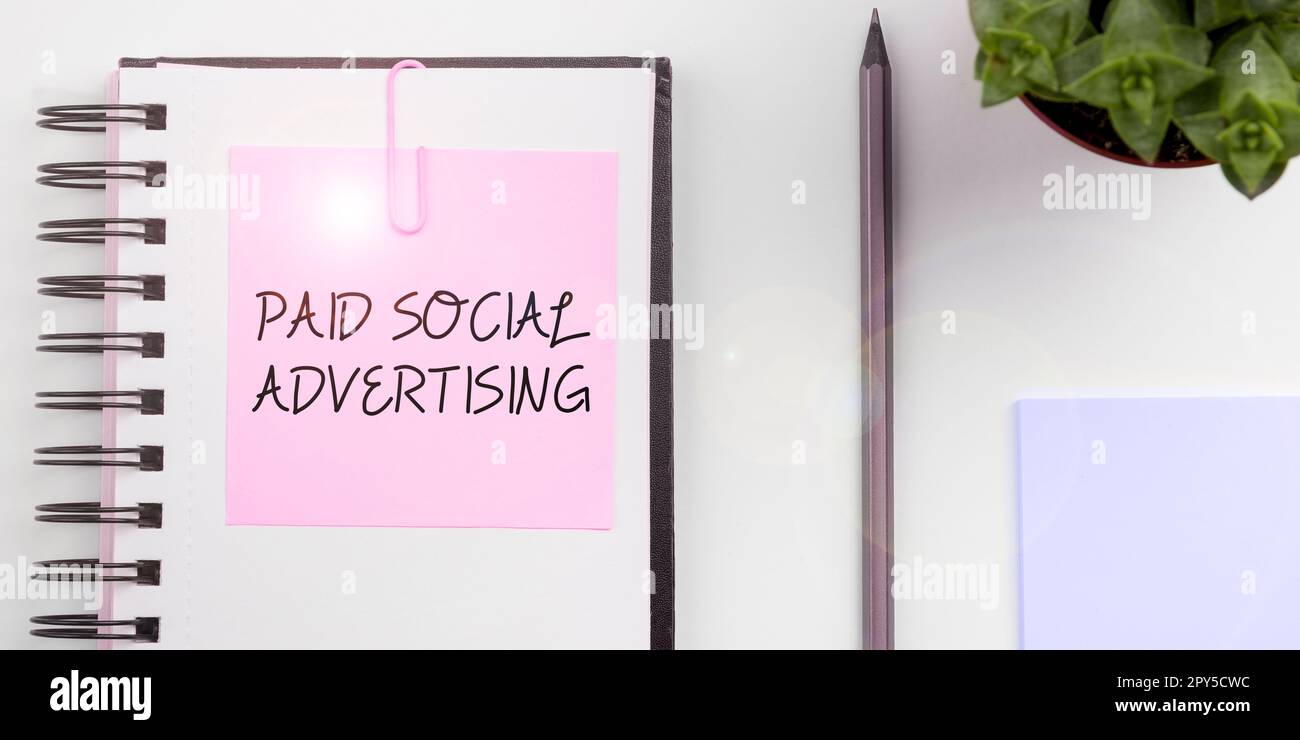 Writing displaying text Paid Social Advertising. Business idea way to ...