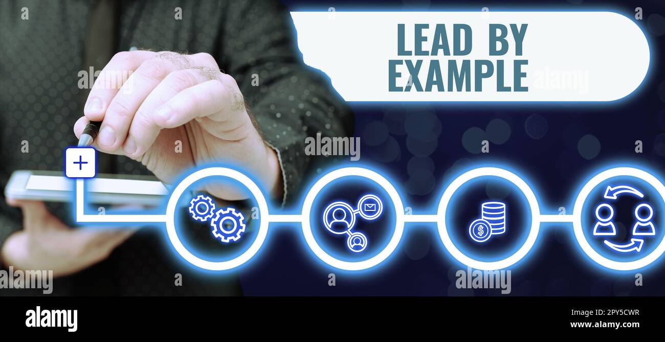 Sign displaying Lead By Example. Business showcase Be a mentor leader ...