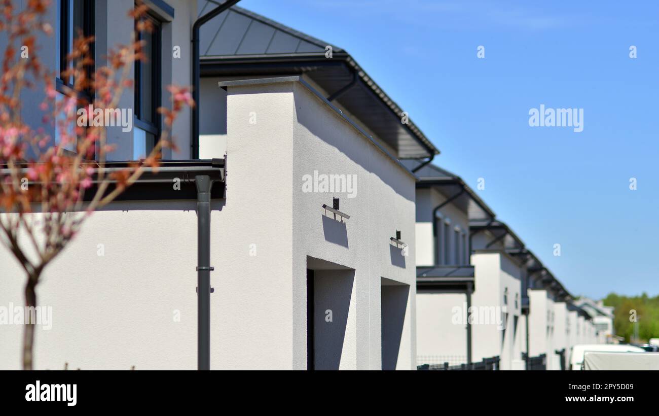 Terraced family homes in newly developed housing estate. The real ...