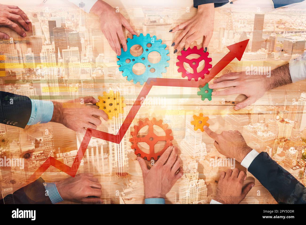 Business team connect pieces of gears like a teamwork and partners ...