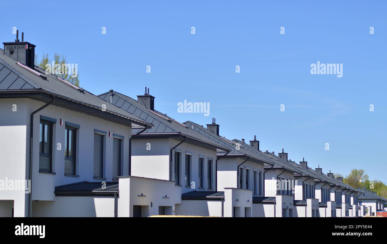 Terraced family homes in newly developed housing estate. The real ...