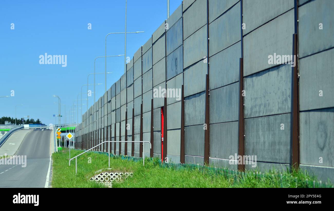 Soundproof shield. High noise insulation panels on the road Stock Photo ...