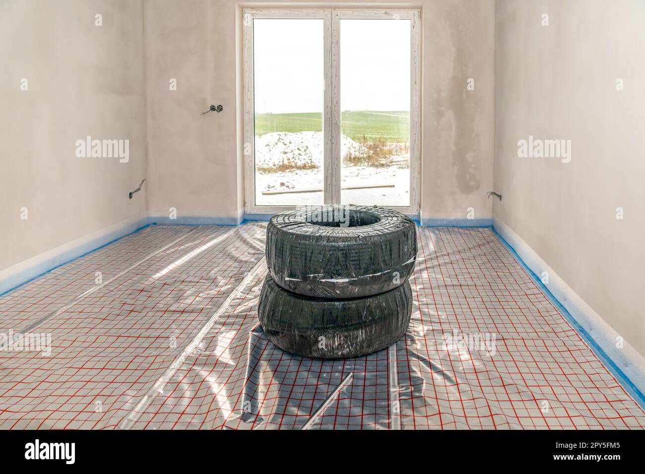 room ready for installation of underfloor heating Stock Photo - Alamy