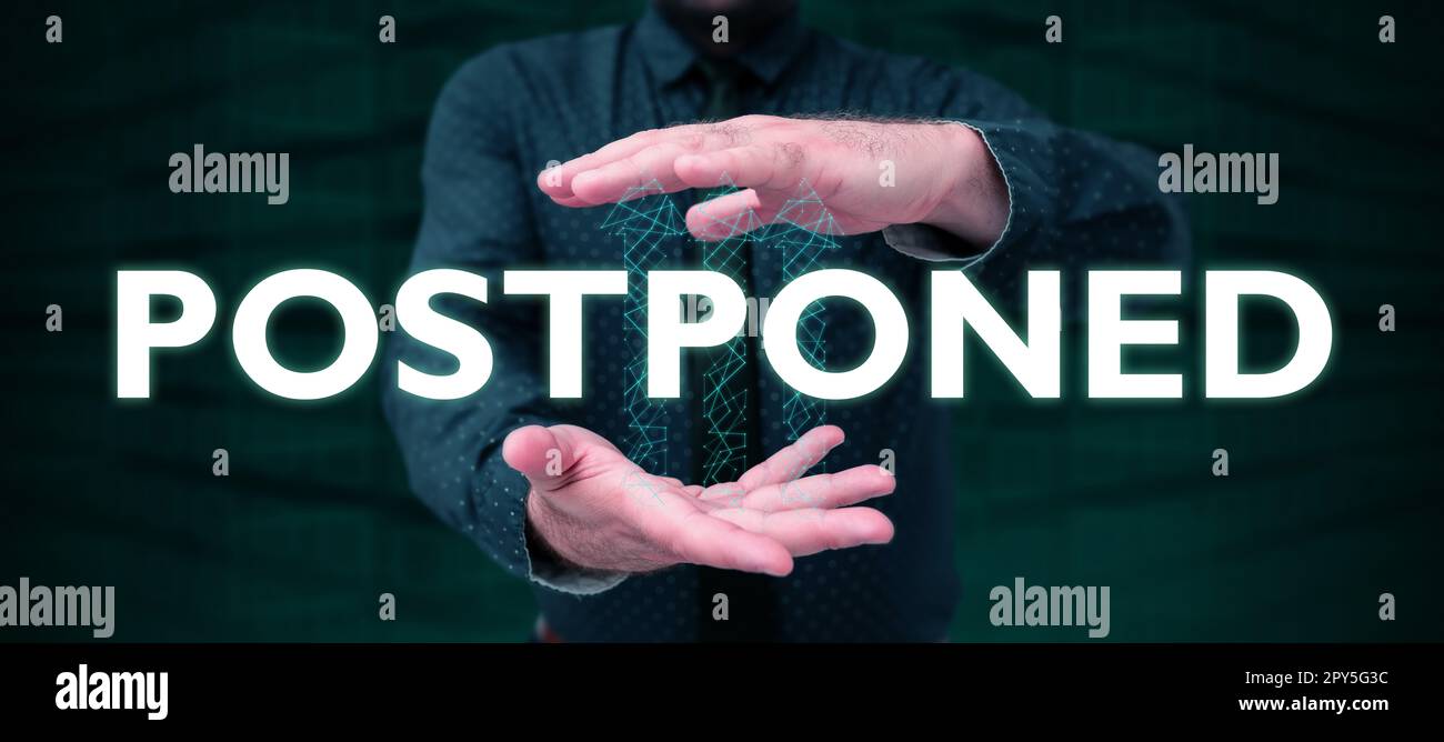 Inspiration showing sign Postponed. Word Written on to place later in ...