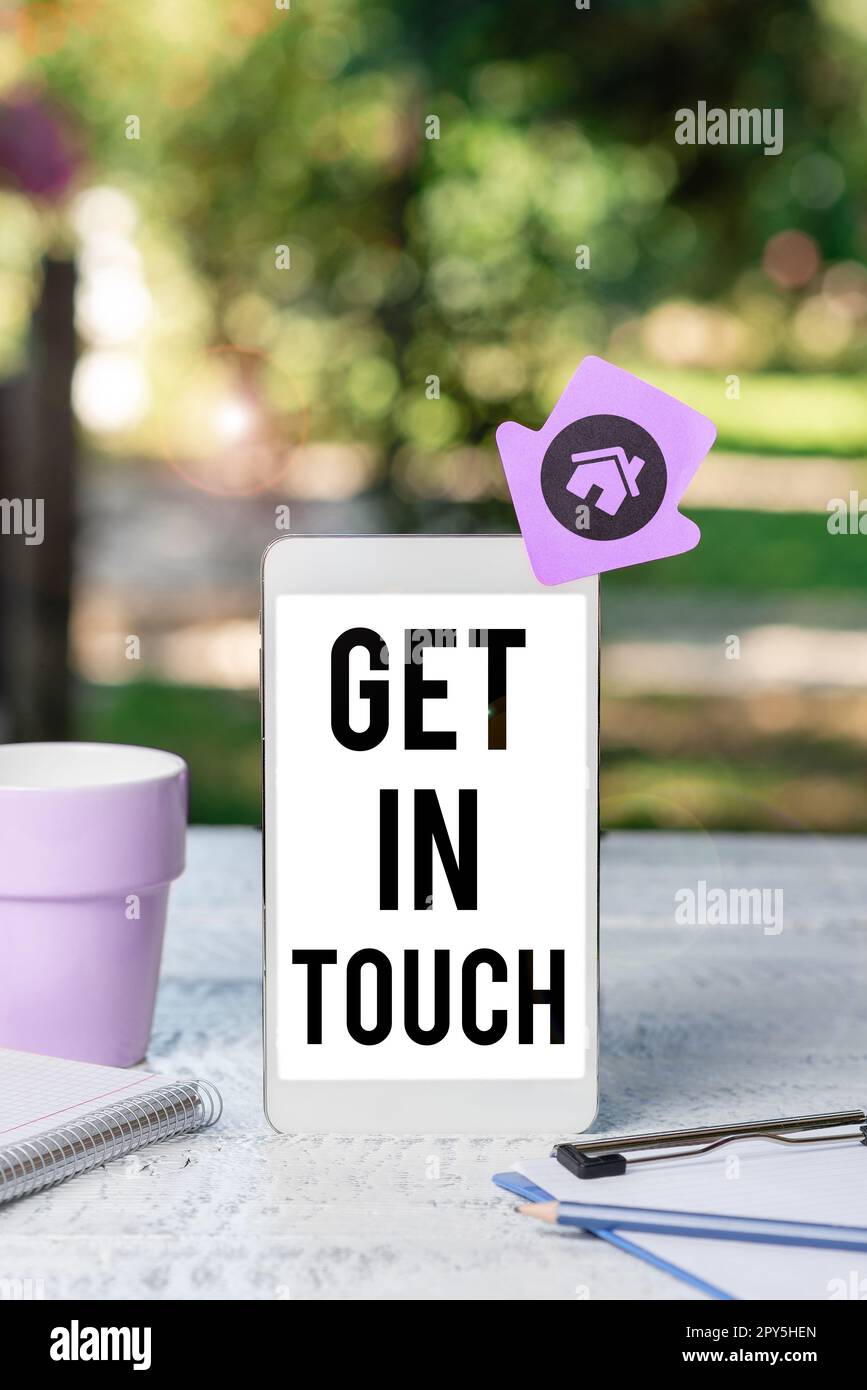 Hand writing sign Get In Touch. Word Written on Stay in contact ...