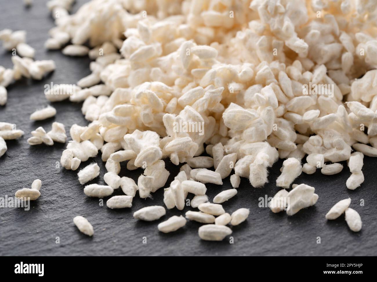 Close-up of rice koji placed on black background. Koji Stock Photo - Alamy