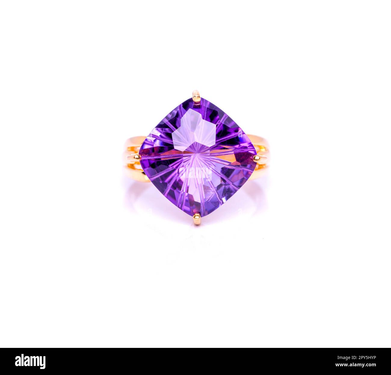 Amethyst Jewel or gems ring on white background with reflection ...