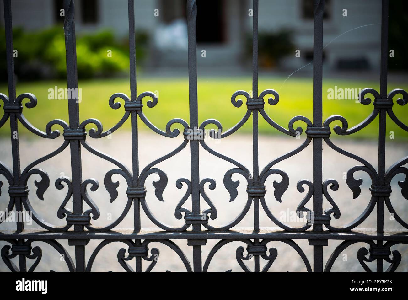Forged iron fence Stock Photo - Alamy
