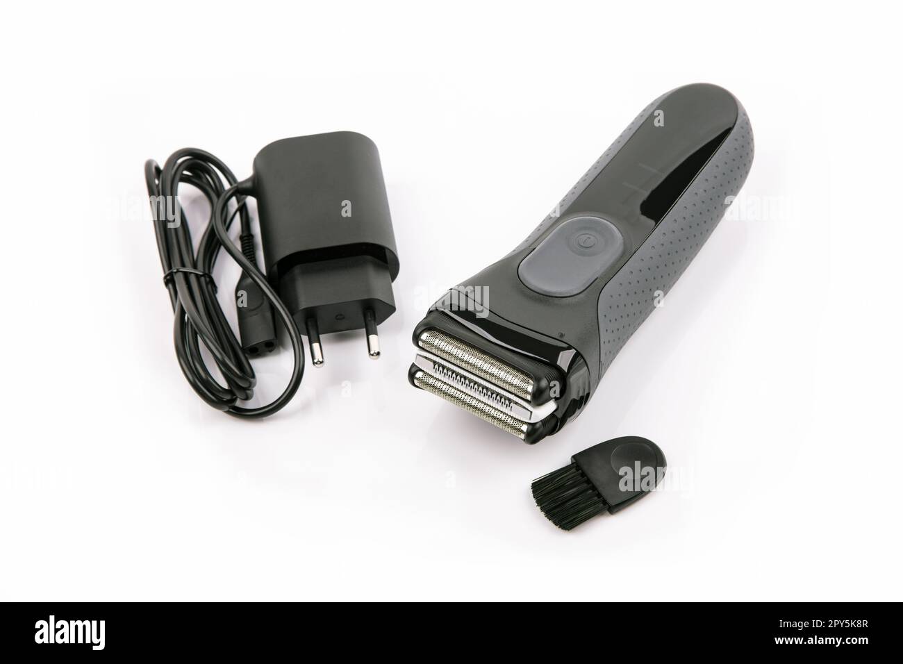 Electric Shaver and Power Adapter Stock Photo - Alamy