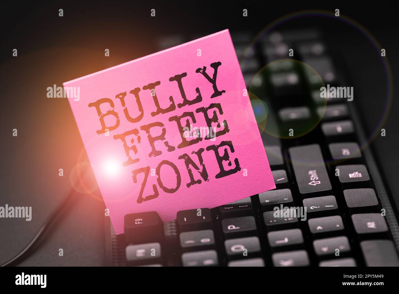 Hand writing sign Bully Free Zone. Concept meaning Be respectful to ...