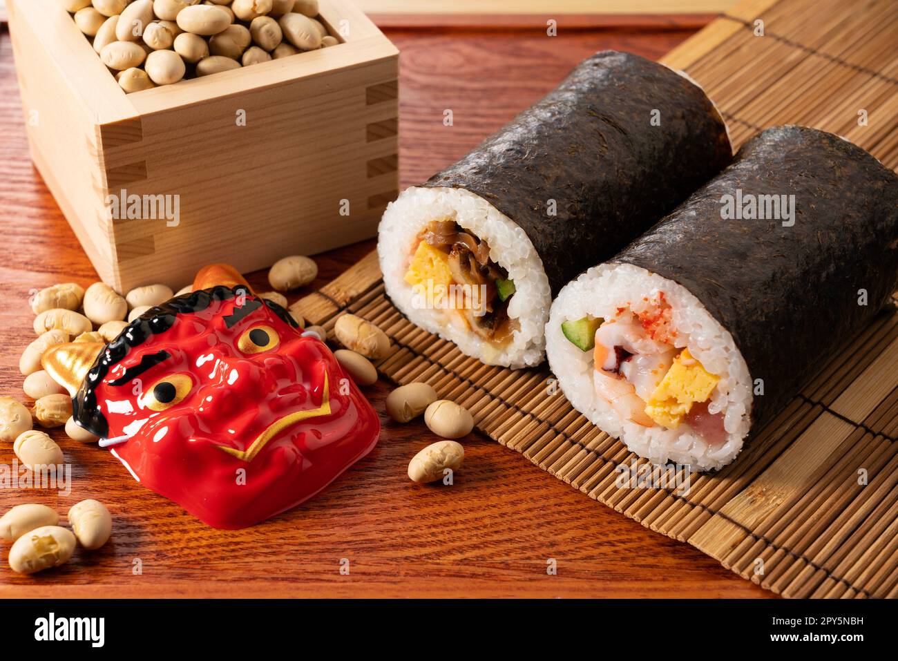 Eho-maki rolls, beans for mame-maki (bean-throwing), and demon masks on ...