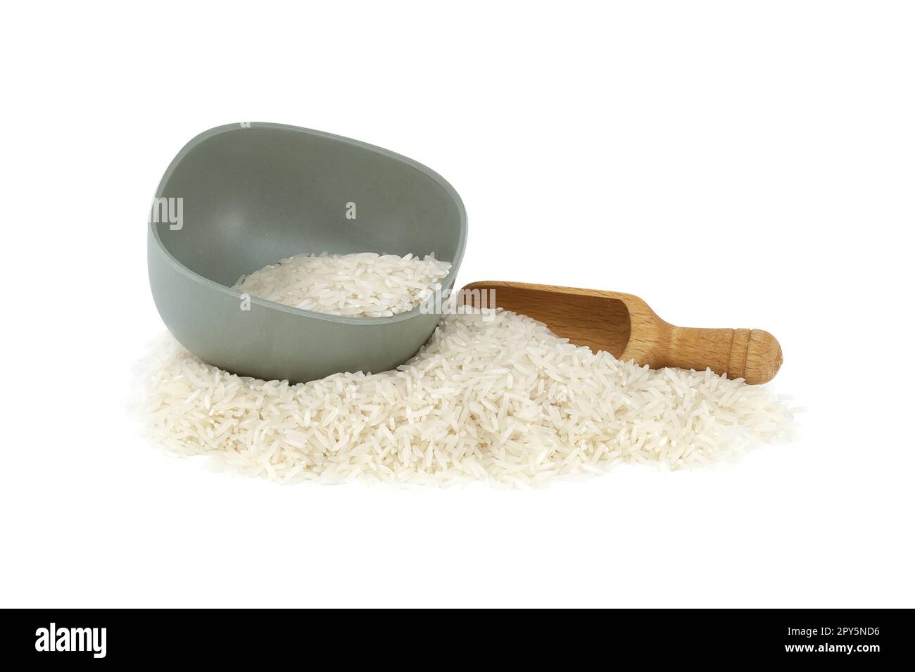 Dry long-grain rice over white background Stock Photo - Alamy