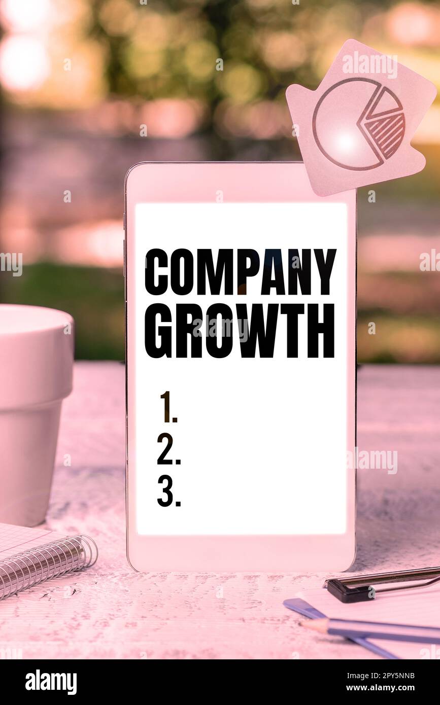 Hand writing sign Company Growth. Business concept a long-term stage ...