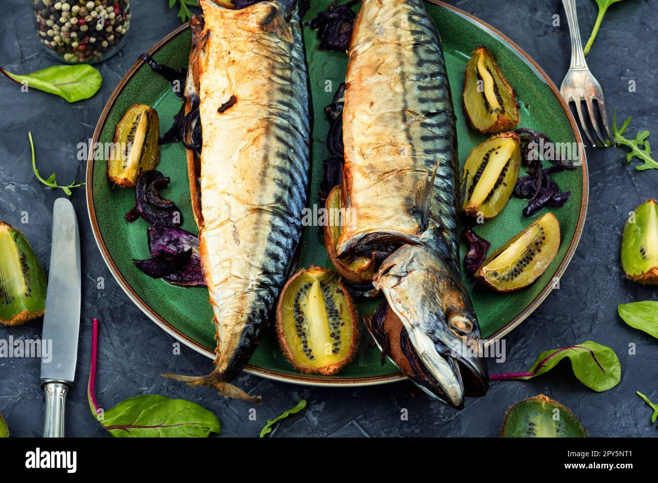 Baked fish, grilled mackerel, close up Stock Photo - Alamy