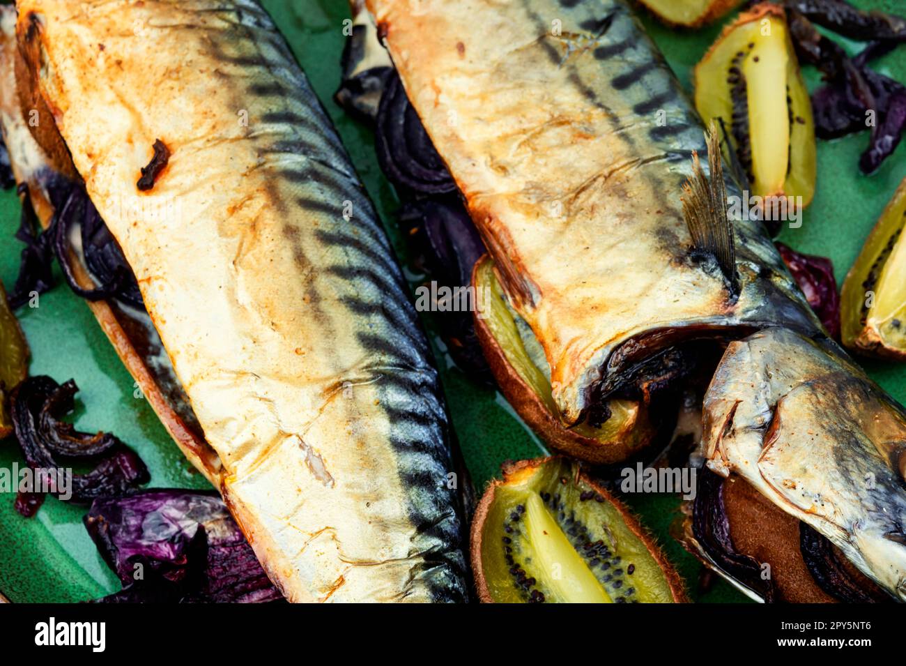 Baked fish, grilled mackerel, close up Stock Photo - Alamy