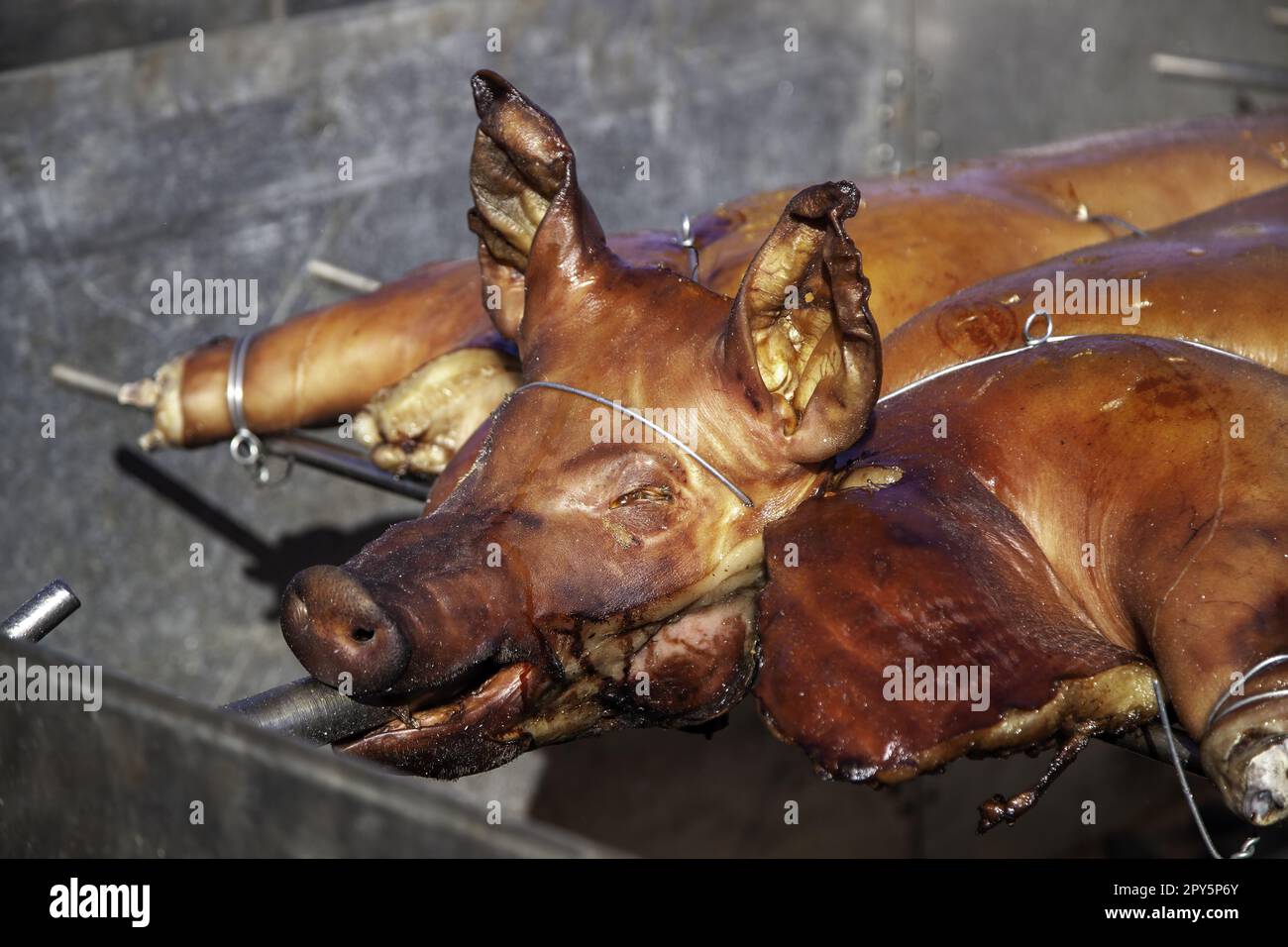 Hog roast whole spit hi-res stock photography and images - Alamy