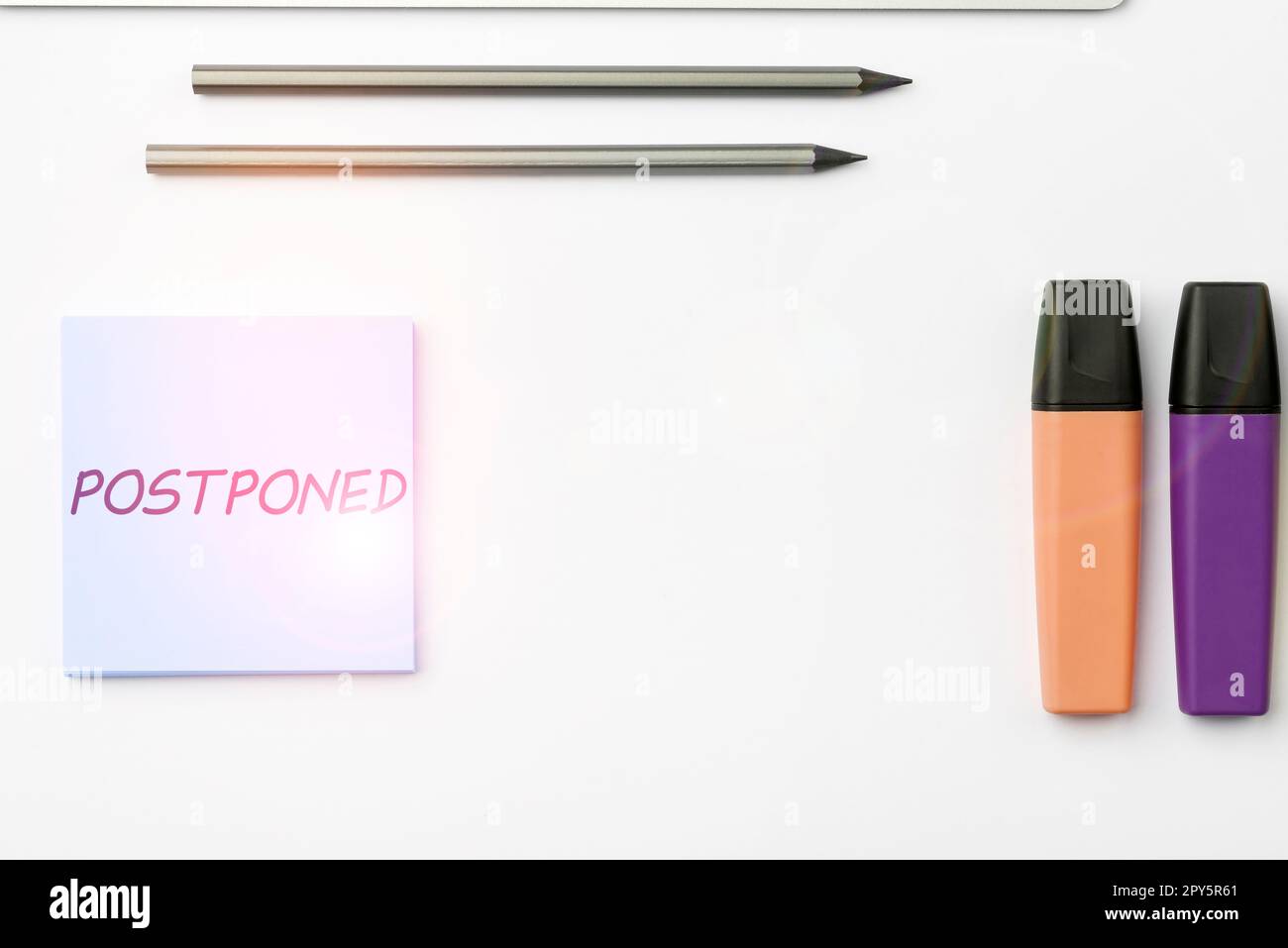 Text sign showing Postponed. Word Written on to place later in order of ...