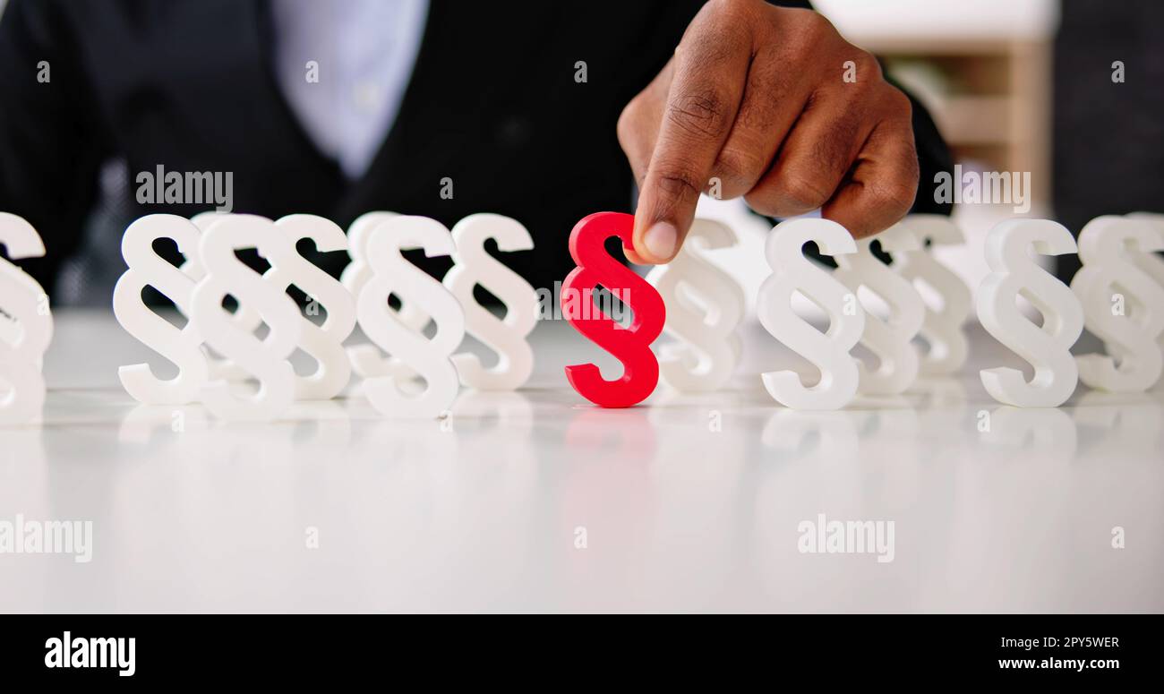 Businessman holding law paragraph hi-res stock photography and images ...