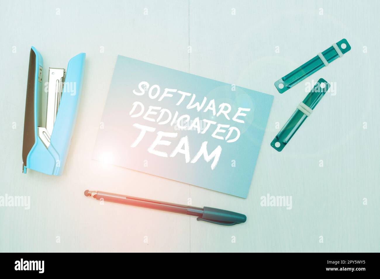 Sign displaying Software Dedicated Team. Word Written on people ...