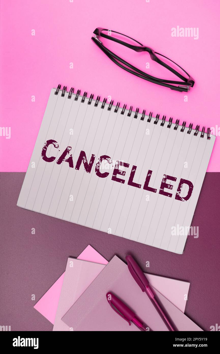 Writing displaying text Cancelled. Internet Concept decide or announce ...
