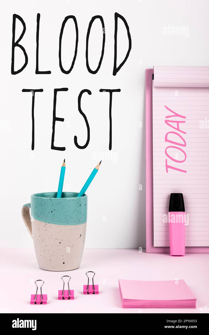 Text showing inspiration Blood Test. Word Written on Extracted blood ...