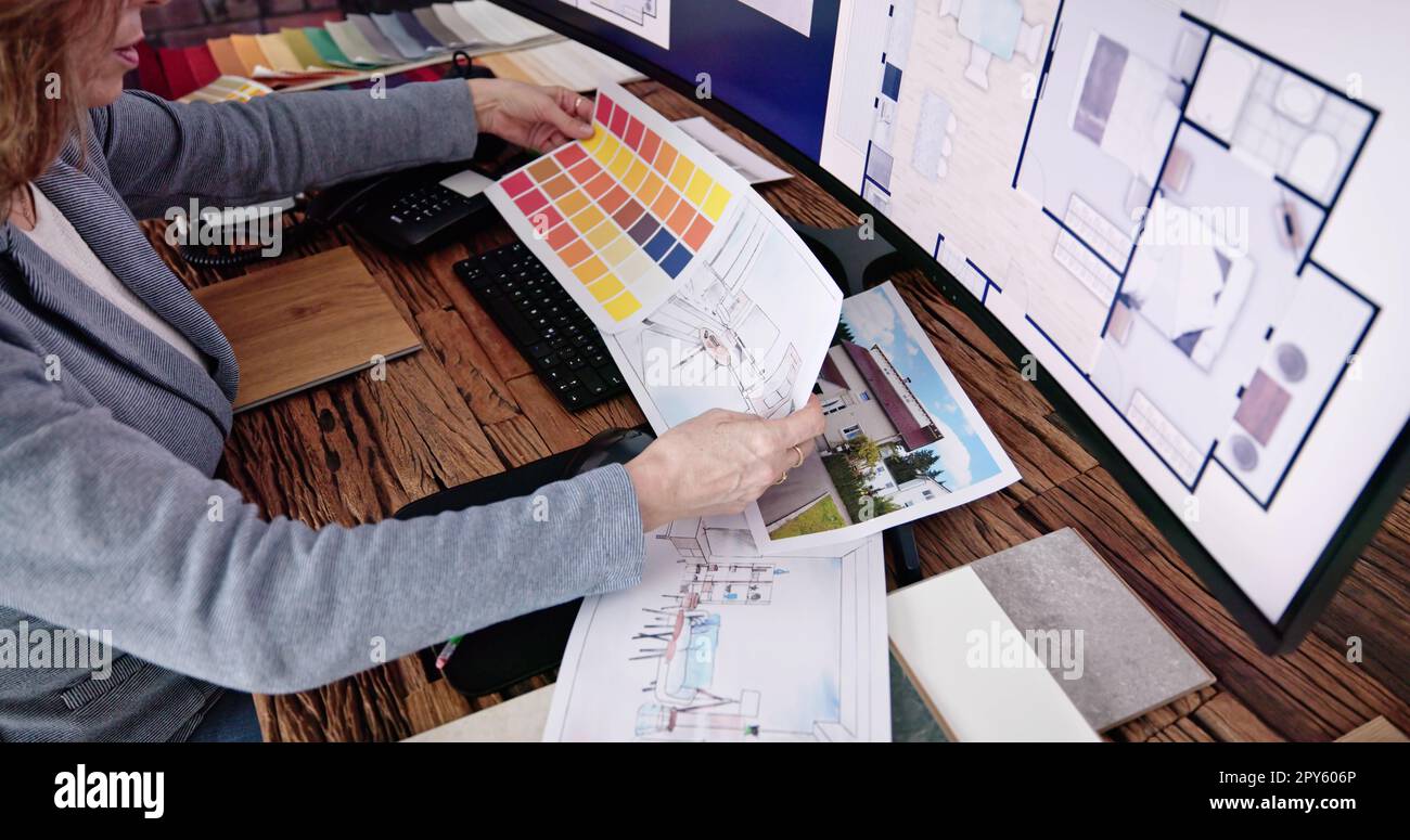 Senior woman designer using hi-res stock photography and images - Alamy