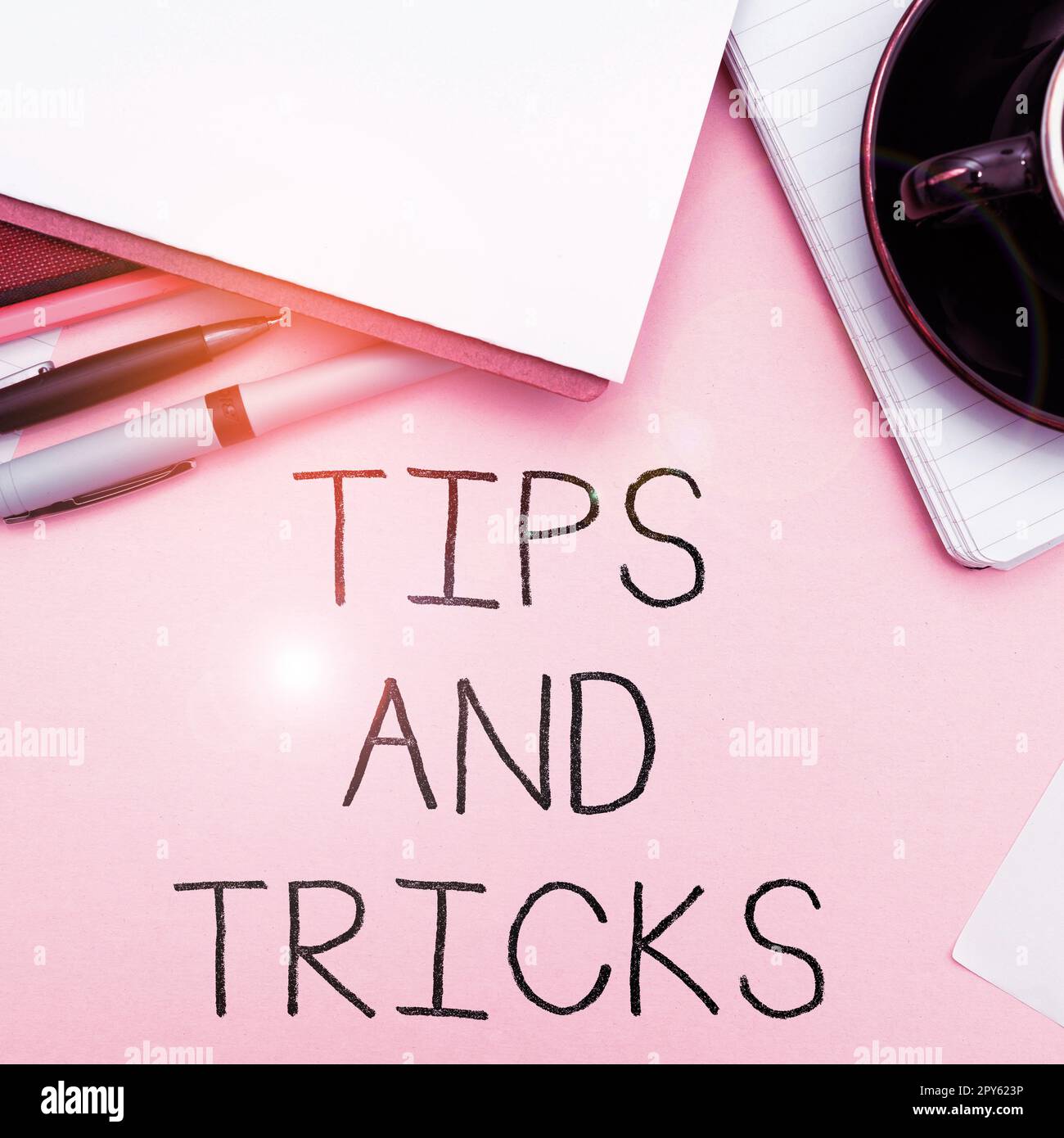 Hand writing sign Tips And Tricks. Word Written on helpful advices that ...