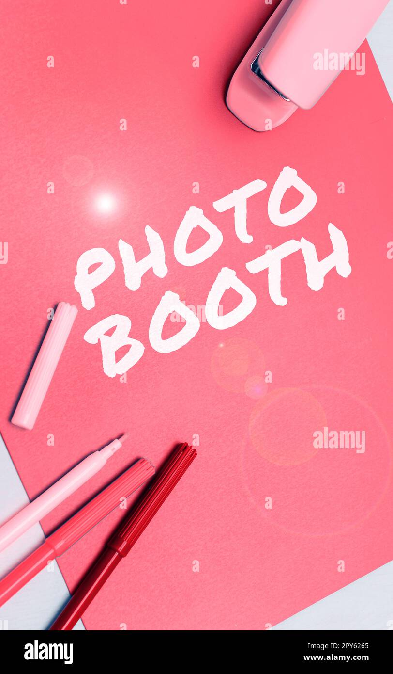 Hand writing sign Photo Booth. Business approach form of photo sharing ...