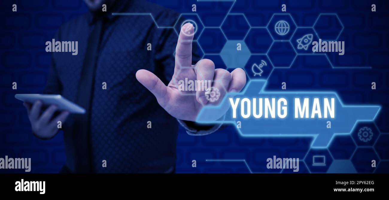 Sign displaying Young Man. Word Written on a man who is not far ...