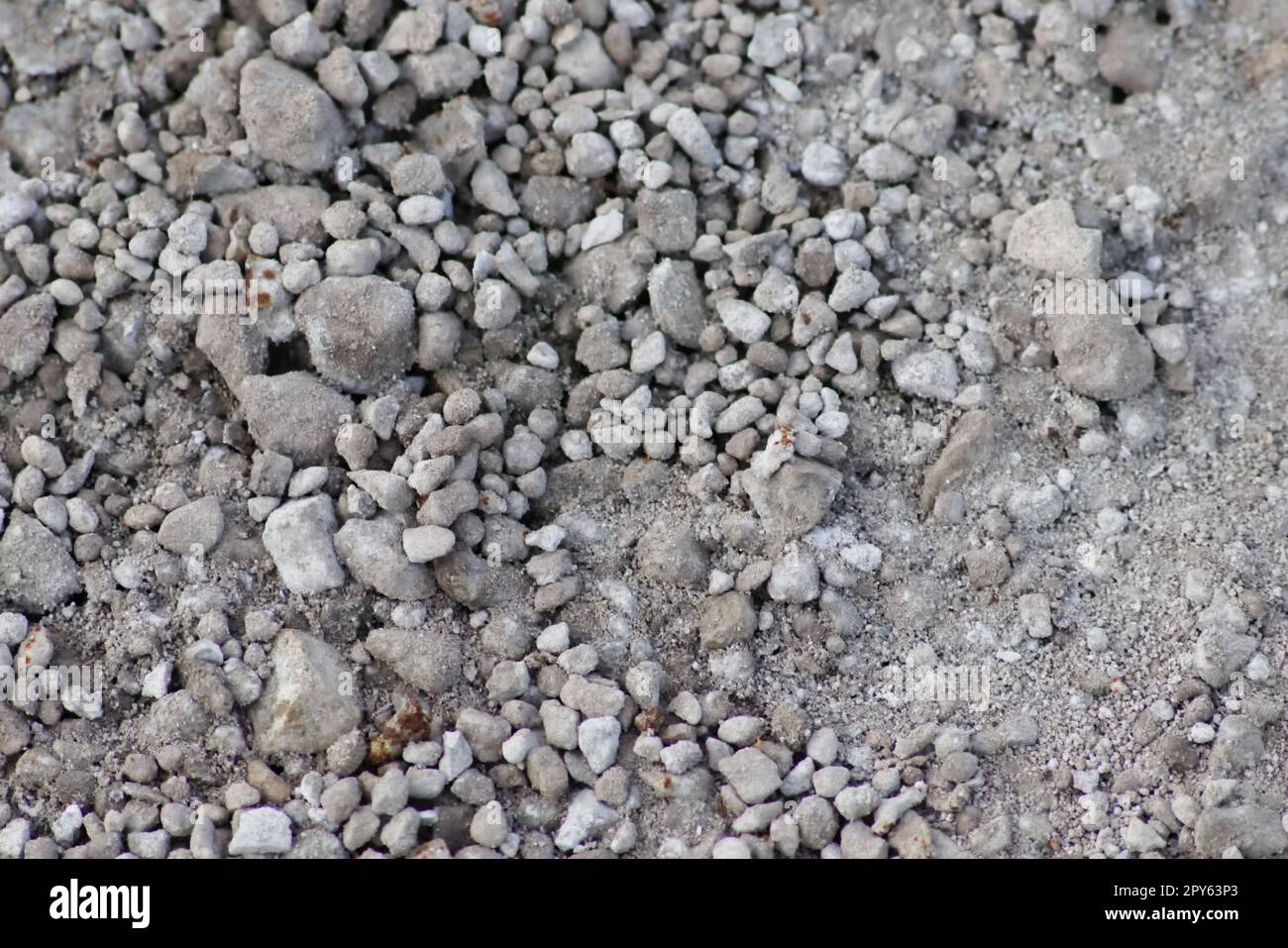 Gray raw rocks and rough stones as natural stones background with ...