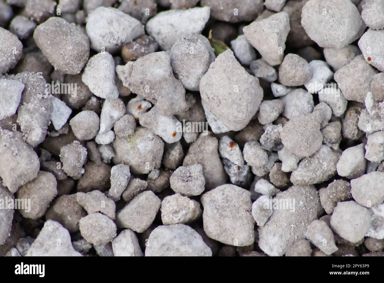 Gray raw rocks and rough stones as natural stones background with ...