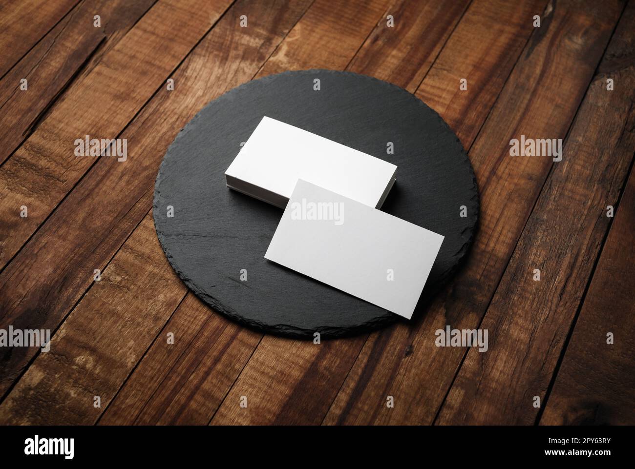 Business cards and slate plate Stock Photo - Alamy