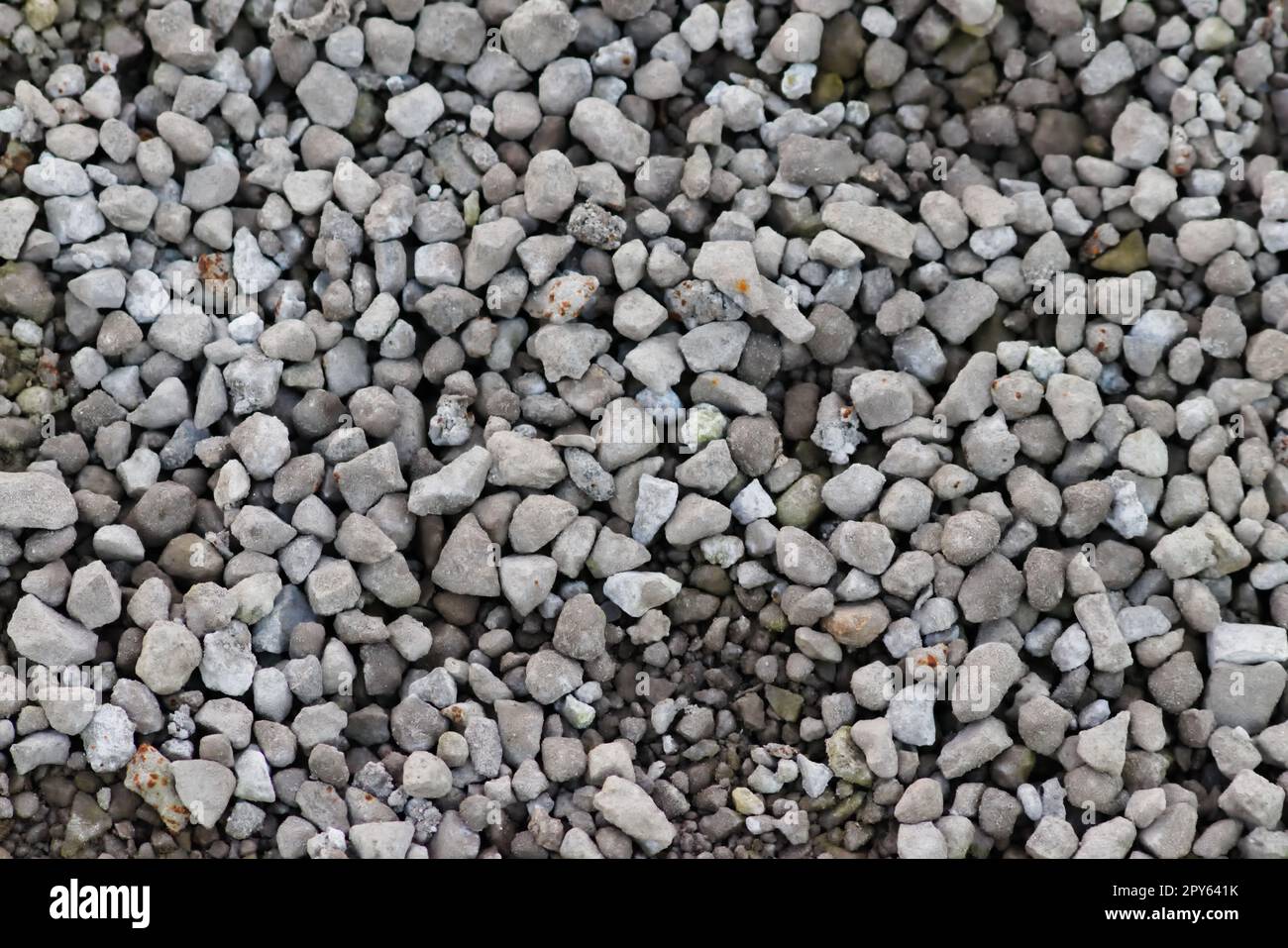 Gray raw rocks and rough stones as natural stones background with ...