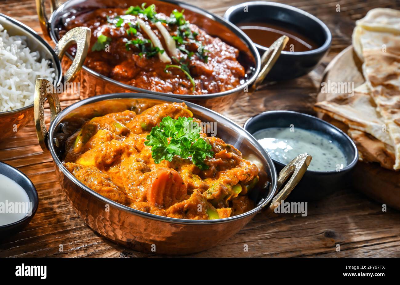 Hot madras paneer and vegetable masala with rice Stock Photo - Alamy