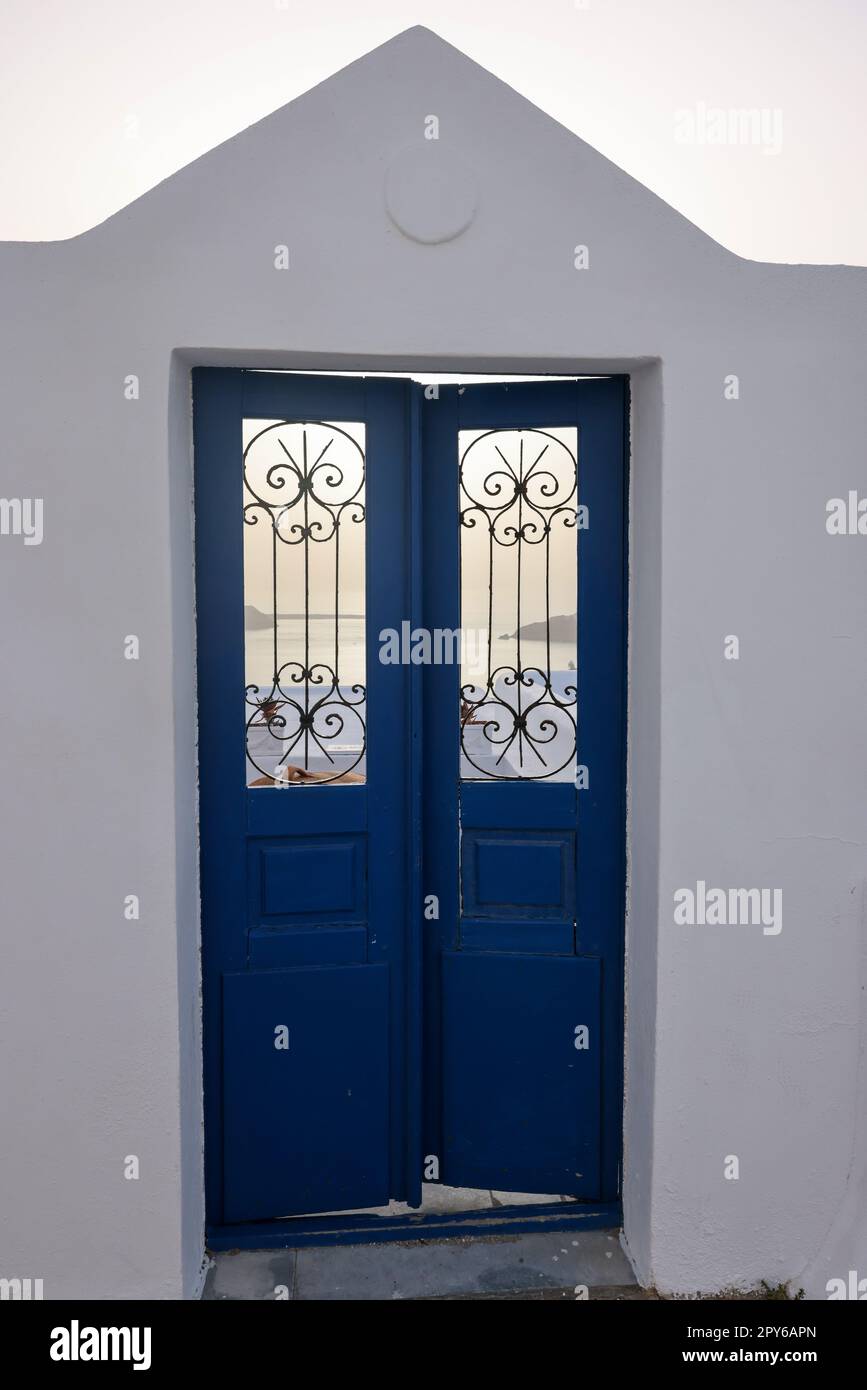 Closed blue door, a traditional piece of architecture on the island of ...
