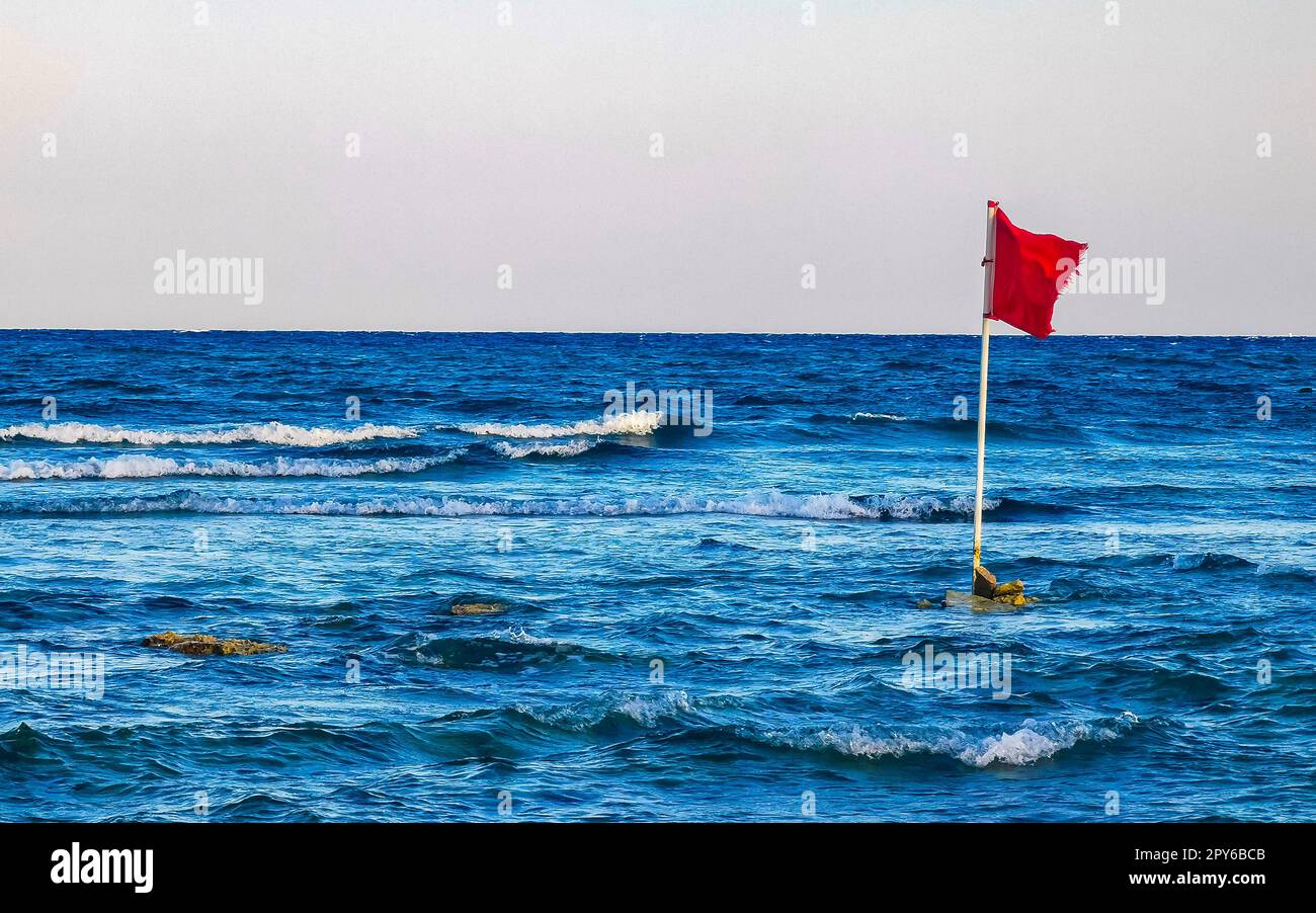 Red flag swimming prohibited high waves Playa del Carmen Mexico Stock ...