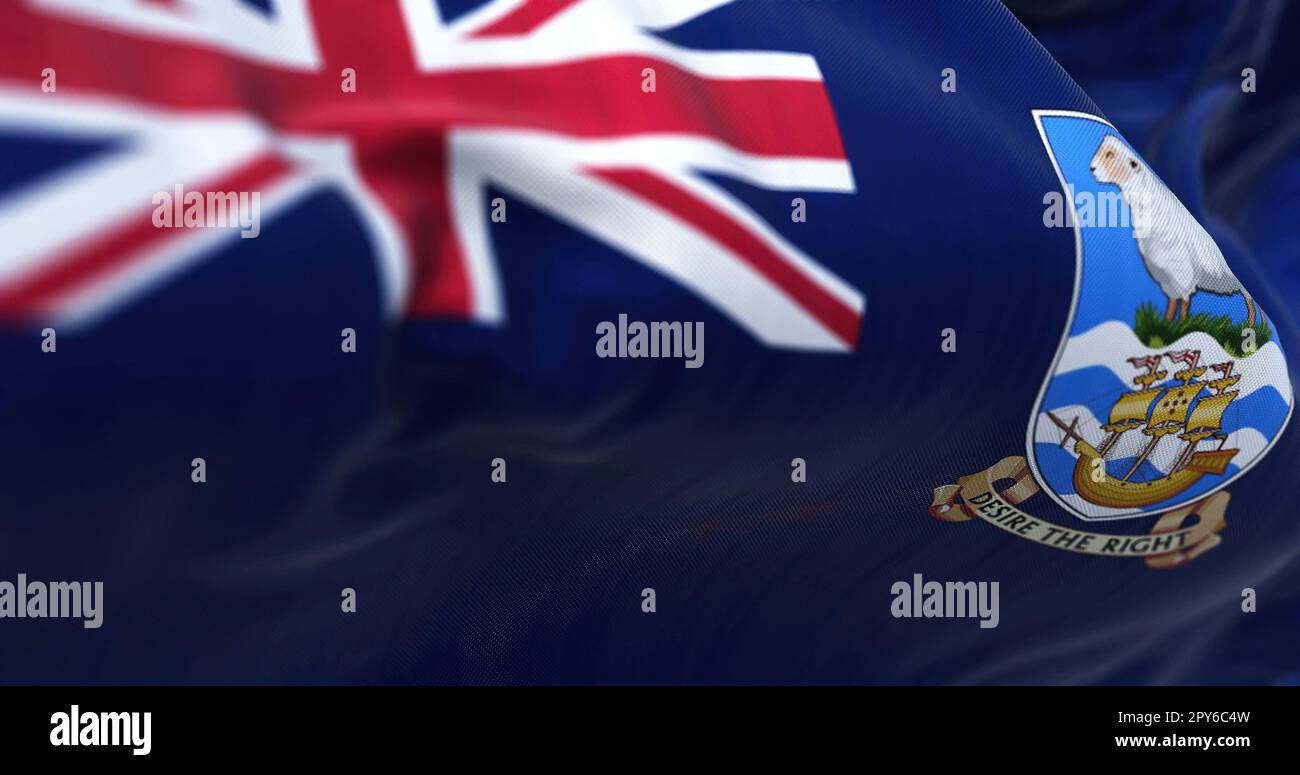 Detail of the Falkland Islands national flag fluttering. Flag has blue ...