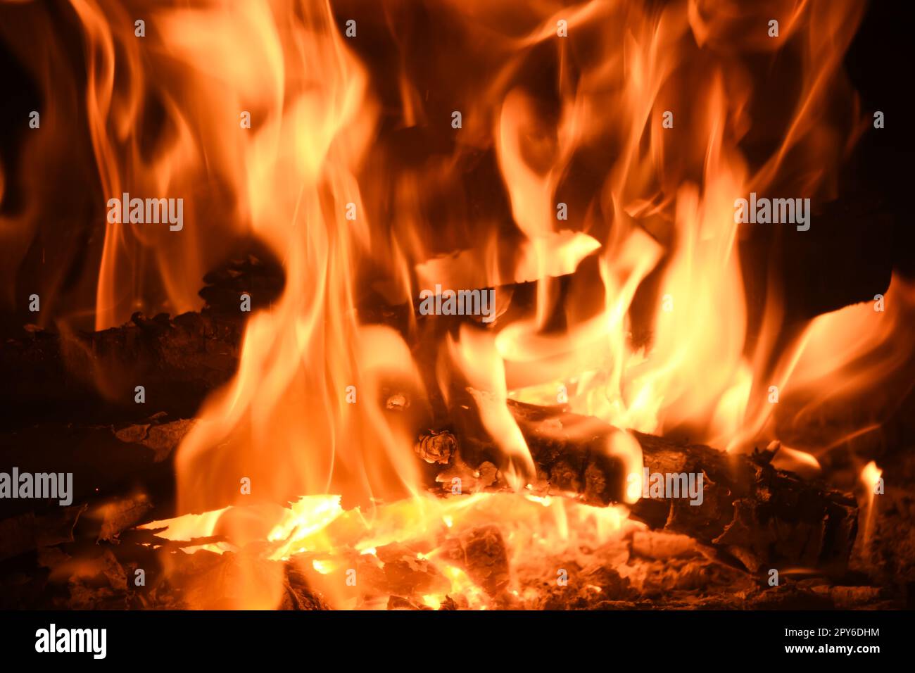 Cozy and warming log fire in the fireplace, in the province of Alicante ...
