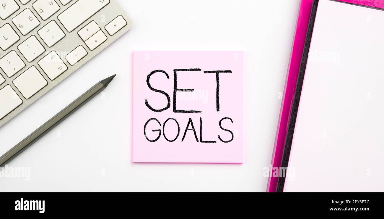 Sign displaying Set Goals. Business overview Defining or achieving ...