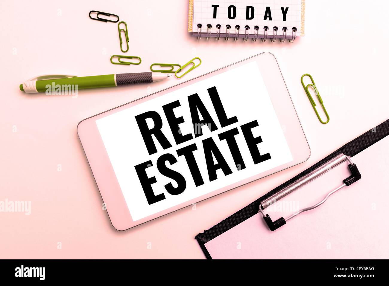 Text showing inspiration Real Estate. Word Written on the property ...