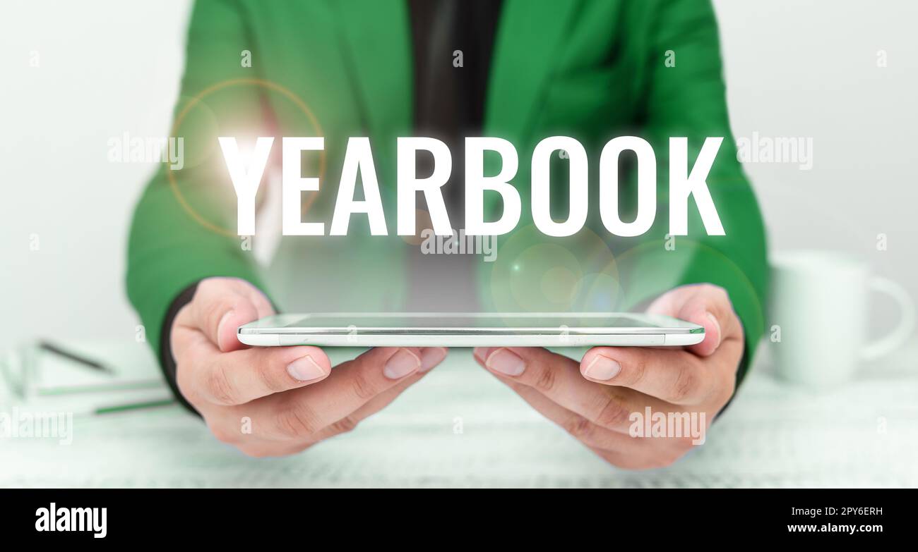 Hand writing sign Yearbook. Business showcase publication compiled by ...