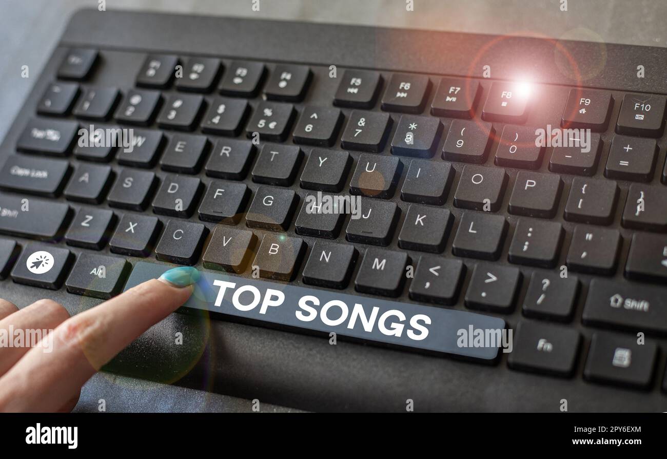 Writing displaying text Top Songs. Word Written on recorded song that ...