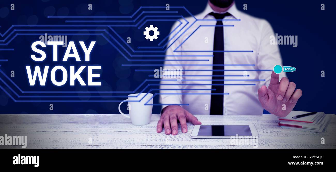 Hand writing sign Stay Woke. Business overview being aware of your ...